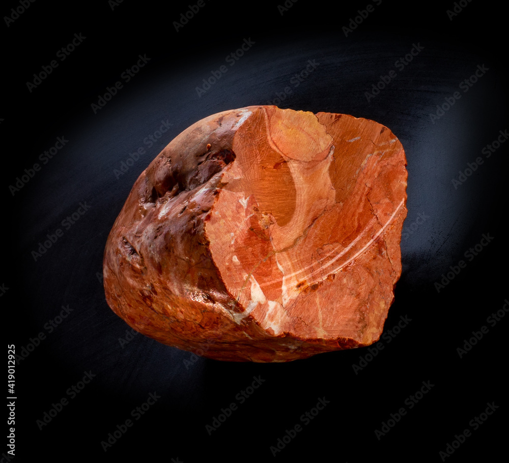 Red metamorphosed limestone mineral from Karadag, Crimea. A photo of a ...