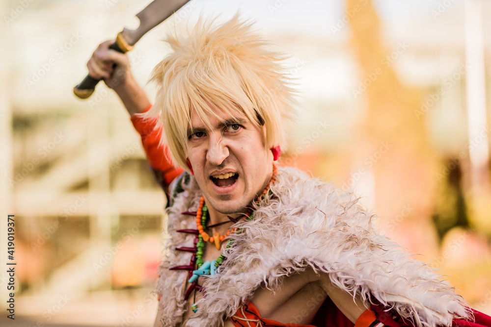 Young hispanic man cosplay character hero fan. Fantasy culture of ...