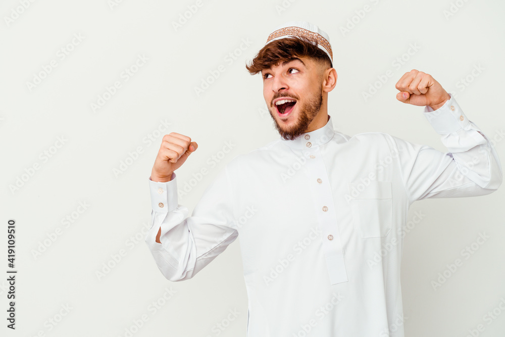 Young Arab man wearing the typical arabic costume isolated on white ...
