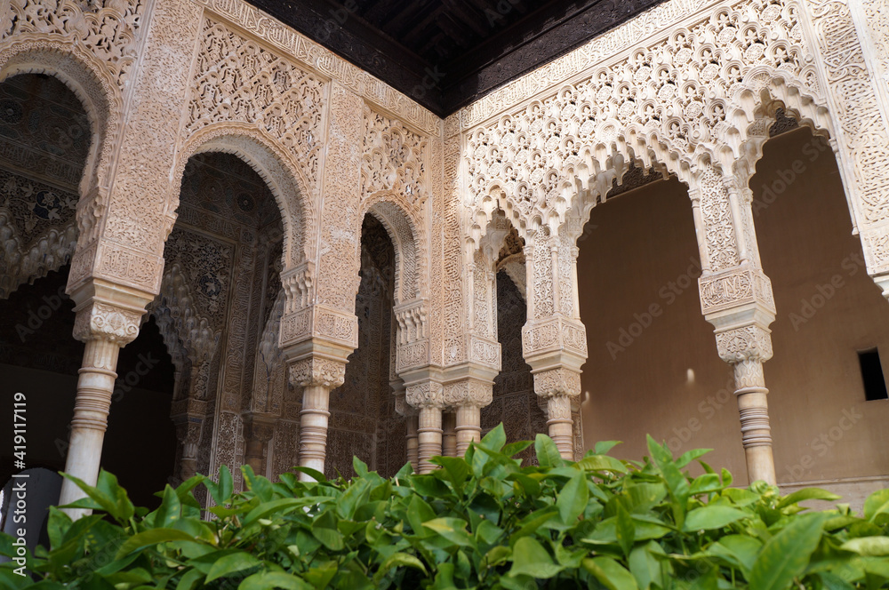 Decorated columns of arches of the Alhambra palace Stock Photo | Adobe ...