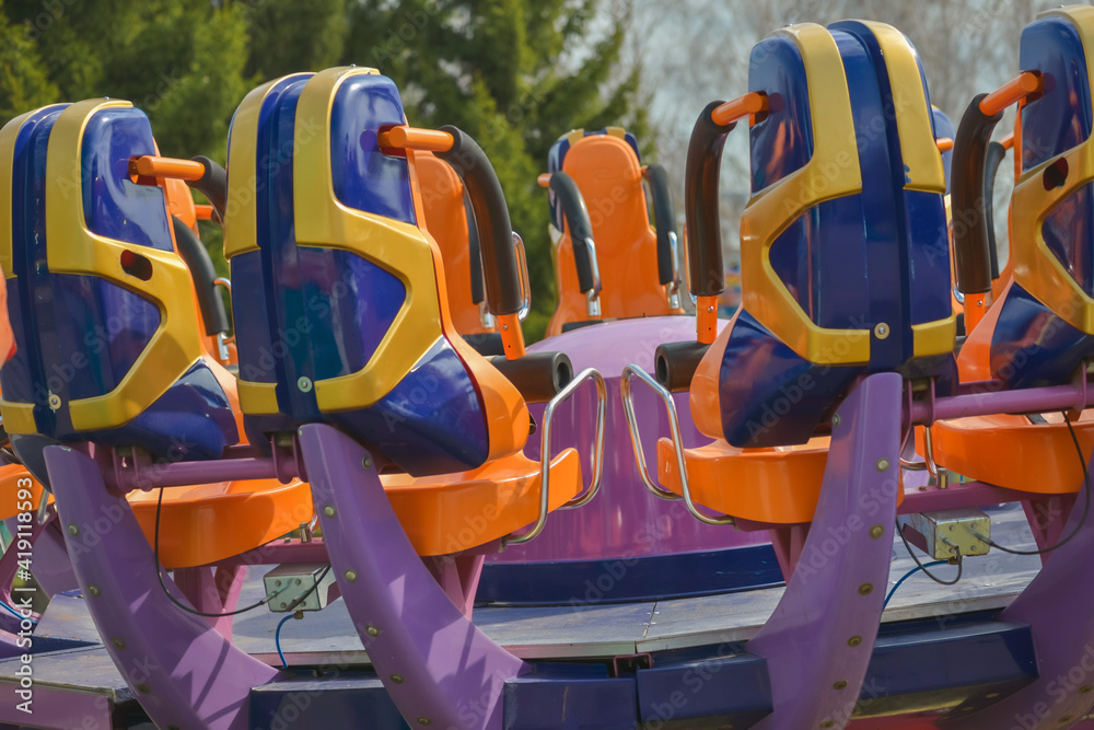 Extreme carousels. Carousel. Amusement park. Carousel with empty seats ...