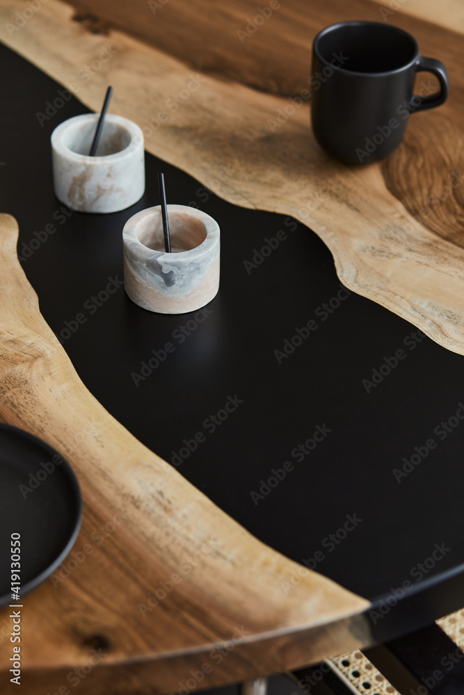 Minimalist composition on the design wooden and epoxy table with black ...