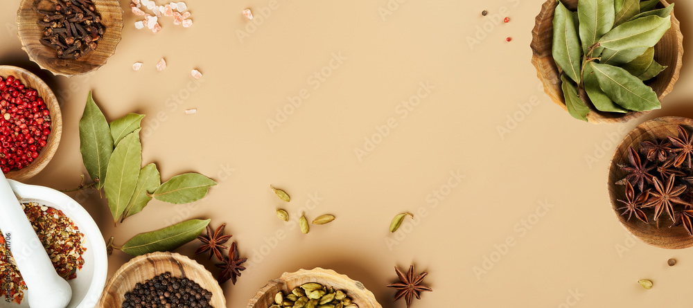Creative food frame mockup with various types of spices Bay leaf, red ...