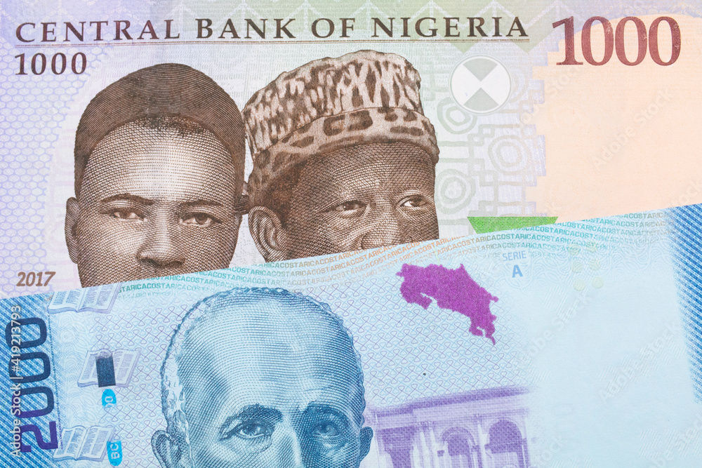 A macro image of a blue, purple and green one thousand naira note from ...