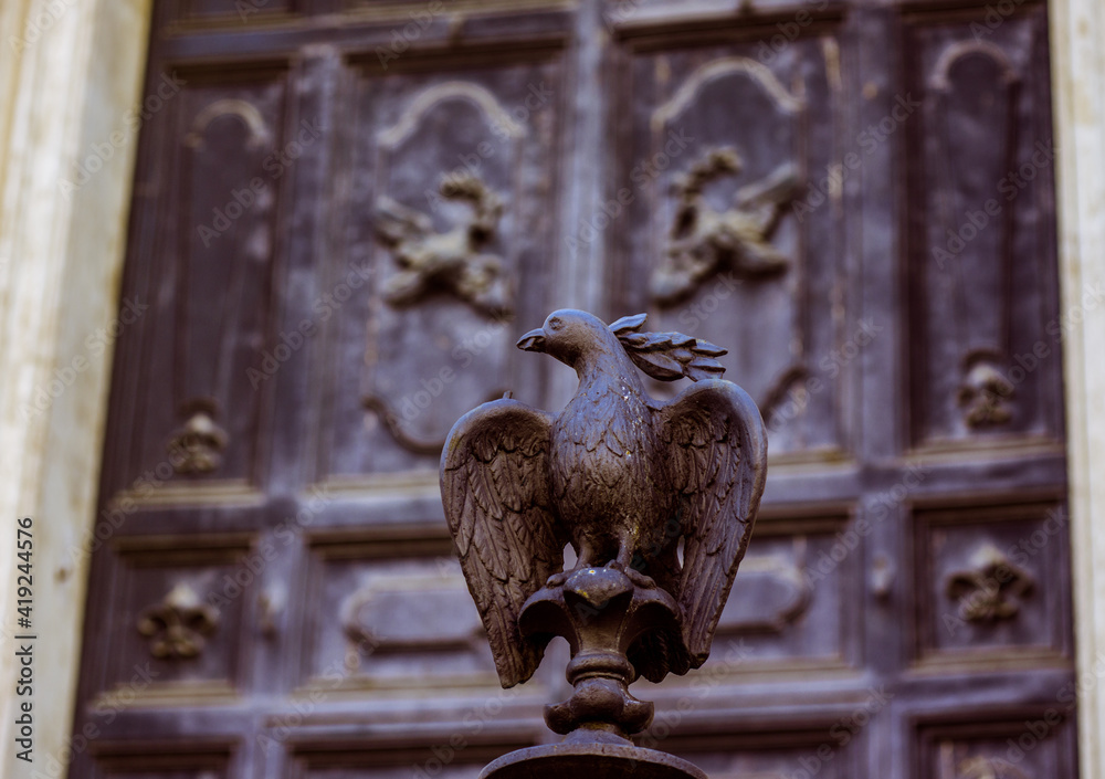 Monument of architecture sculptures of a lion, a wolf, an elephant and ...