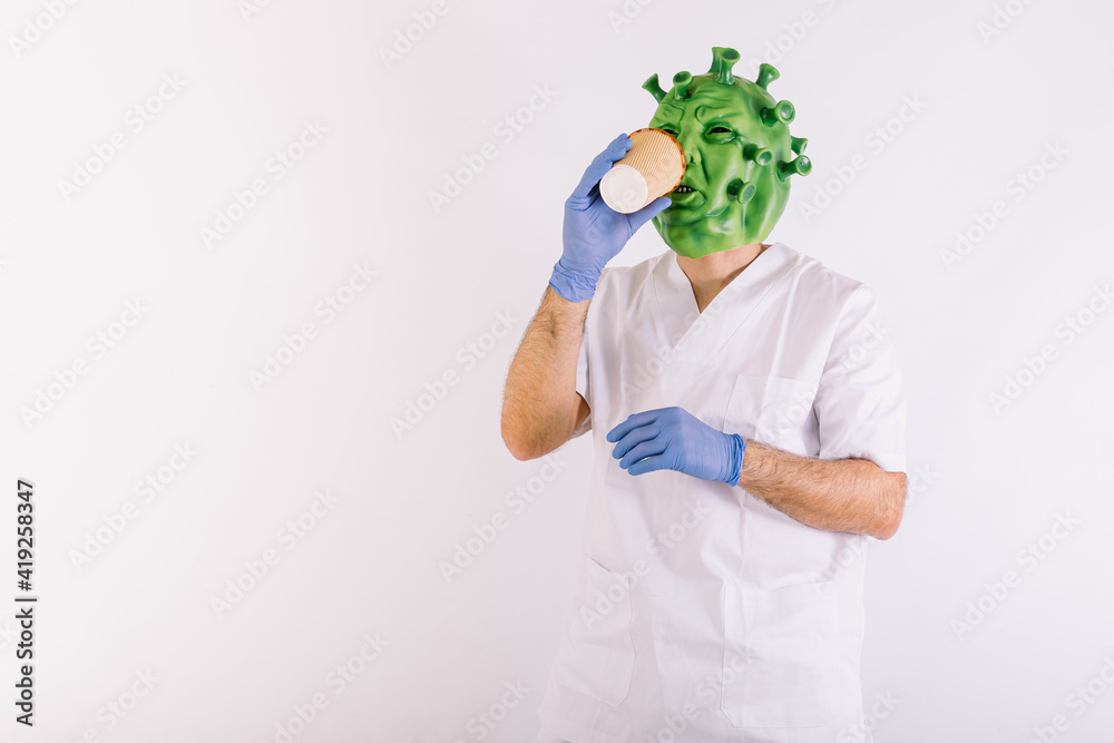 Person disguised as a coronavirus with a latex mask - covid-19 virus ...