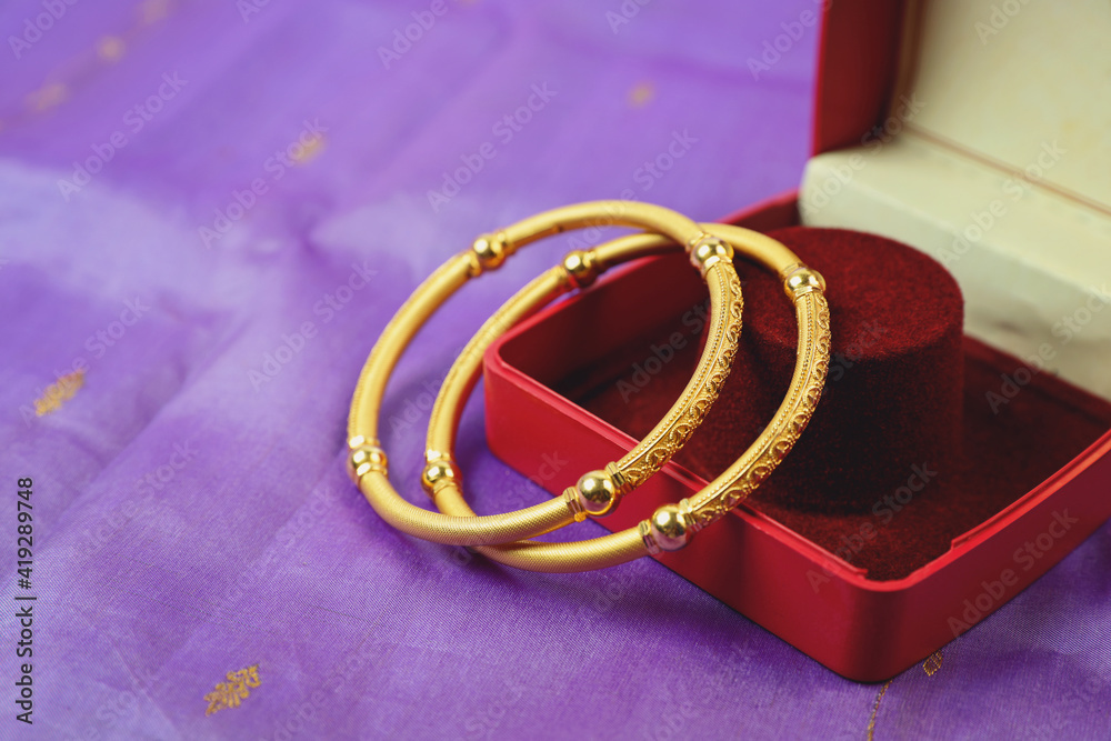 Indian traditional wedding gold Bangles Stock Photo | Adobe Stock