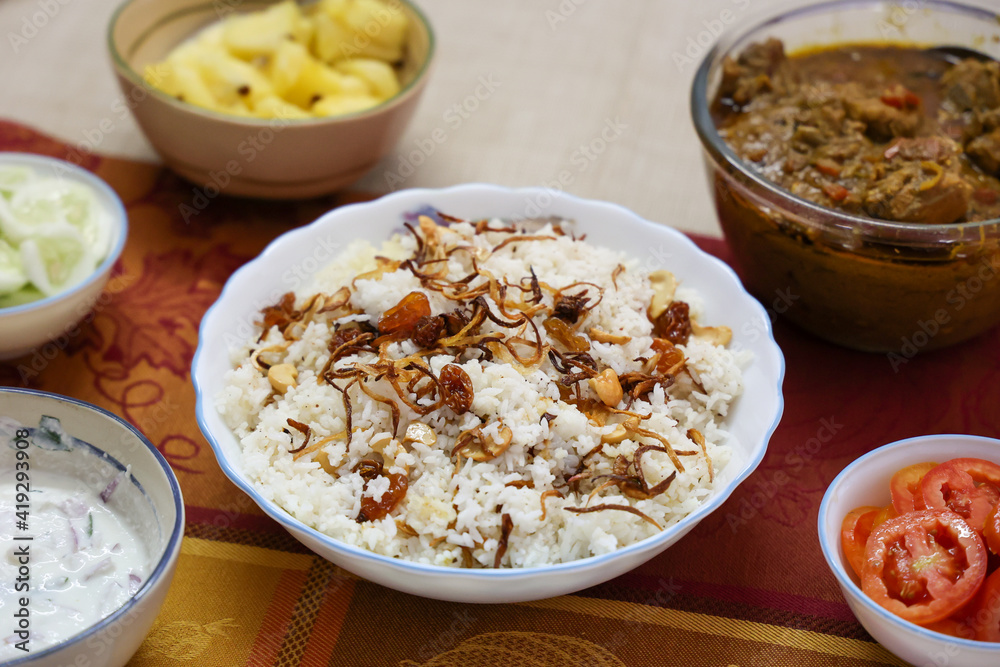 Chicken biryani Spicy Indian Malabar biryani Hyderabadi biryani, Dum ...