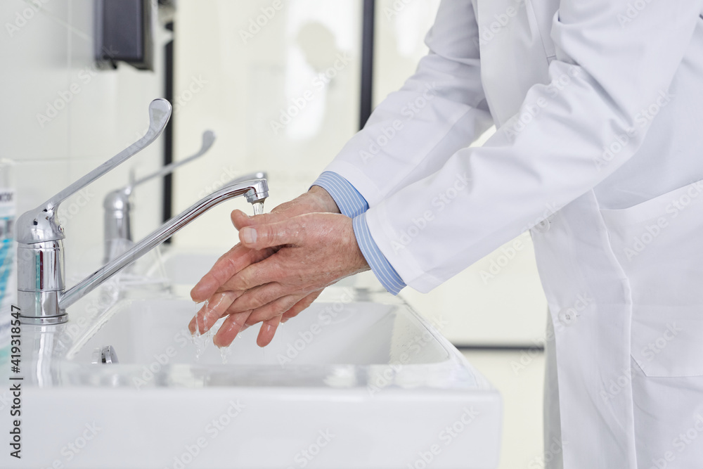 Cropped Doctor washing Hands Before Operation, Side View. Man In ...