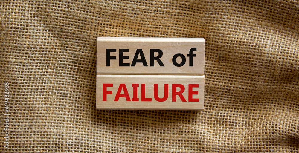Fear of failure symbol. Wooden blocks with words 'fear of failure ...