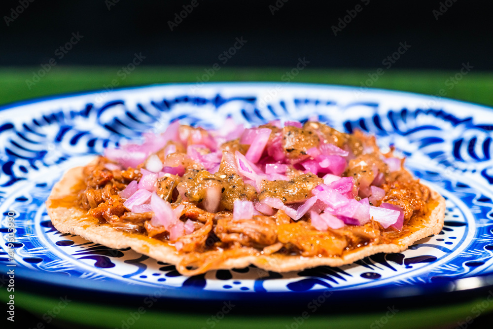 tostada, typical Mexican dish, made from cochinita pibil Stock Photo ...