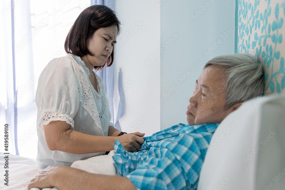 Angry female caregiver grimacing,facial expression of dissatisfaction in helping for the ...