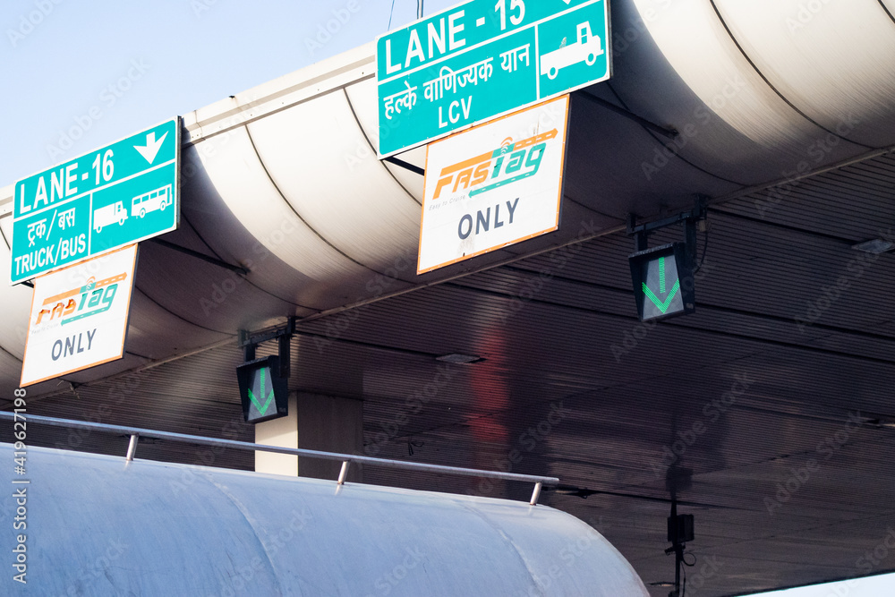 Fast Tag sign near a toll booth showing the new cashless RFID based ...
