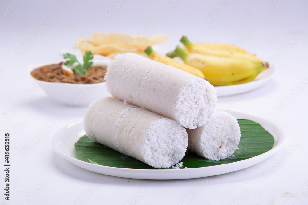 Puttu_white plate_white BG Stock Photo | Adobe Stock