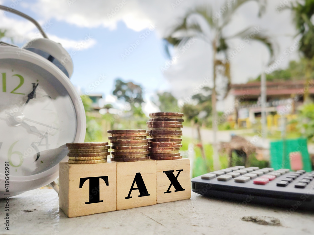 Tax-filling concept - Tax word in vintage background. Stock photo ...
