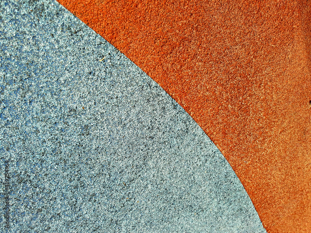 Rubber floor texture background. EPDM playground surface. Blue and red ...