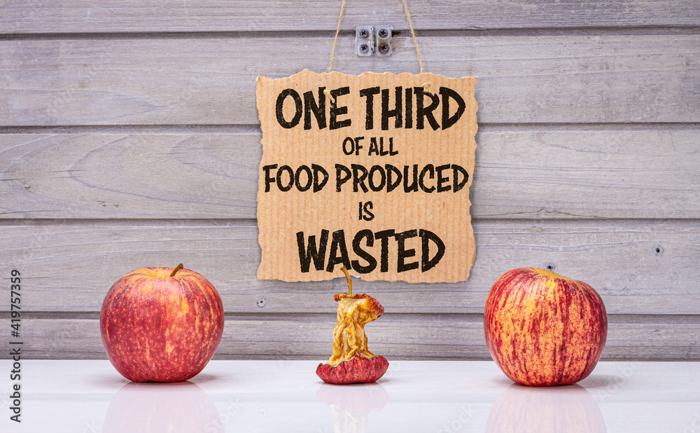 Stockfoto One third of all food is wasted text, 3 apples, one rotten to ...