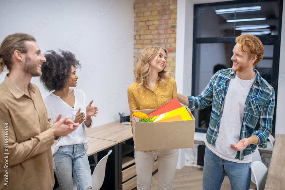 Group of colleagues wishing good luck to their leaving coworker Stock ...
