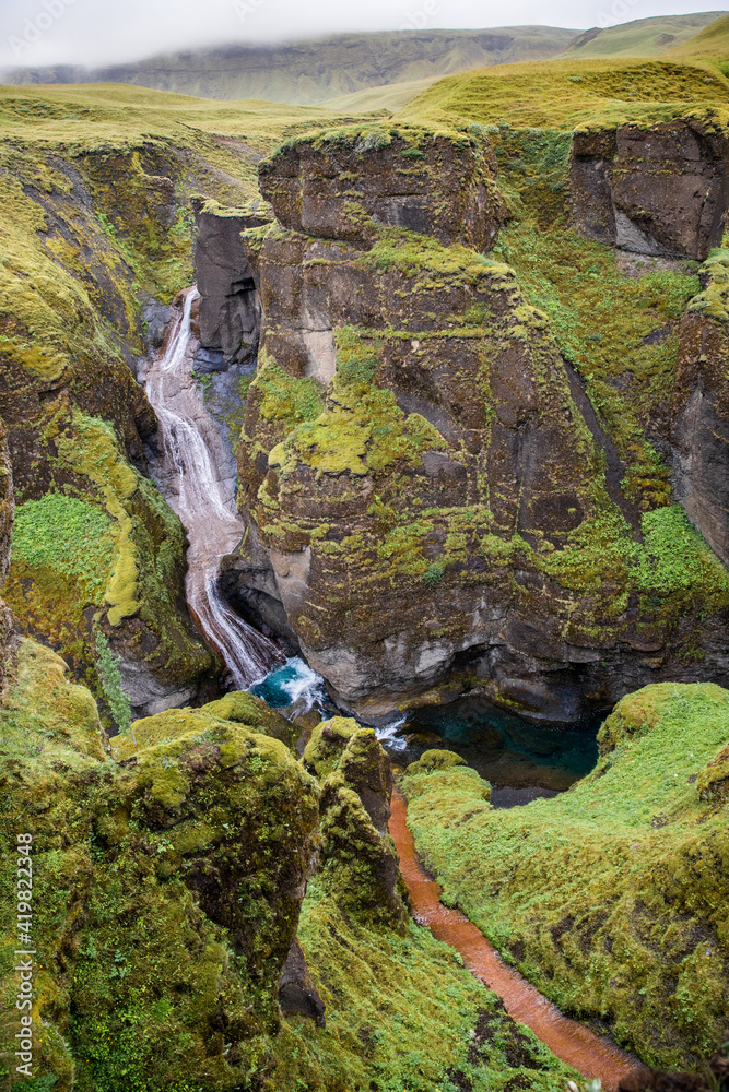Fjaðrárgljúfur, Canyon Fardrargljufur Island Iceland during rainy and ...