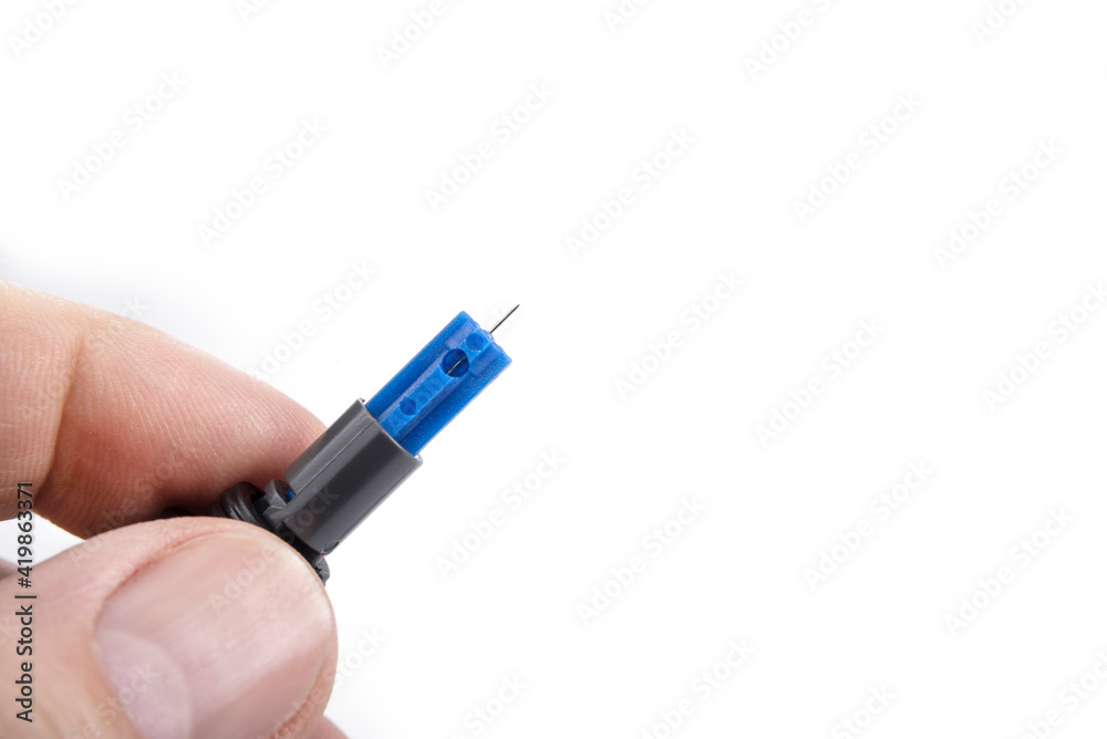 Blood sugar level monitoring with glucose meter. Needle closeup foto de ...