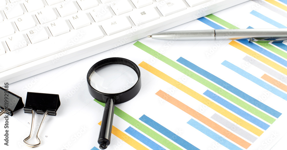 business accounter work with chart and keyboard on white office desk ...