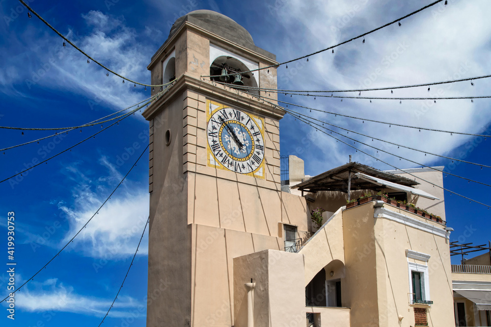 Clock tower of Church of Saint Santo Stefano in Capri town in Italy ...