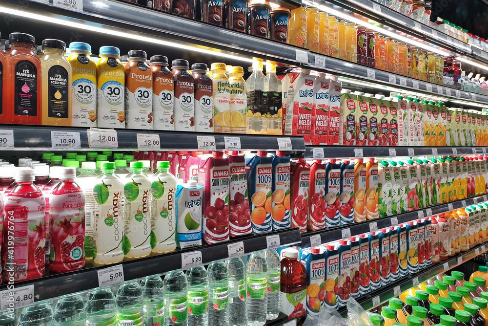 Various brand soft drink, coffee and fruit beverages on the ...