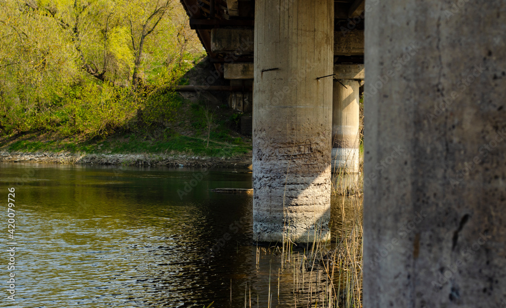 Destruction of the reinforced concrete column of the bridge. Bridge ...