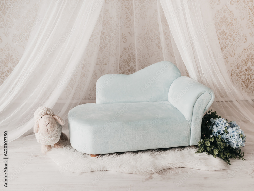 Couch for a baby photo session in a photo studio Stock Photo | Adobe Stock