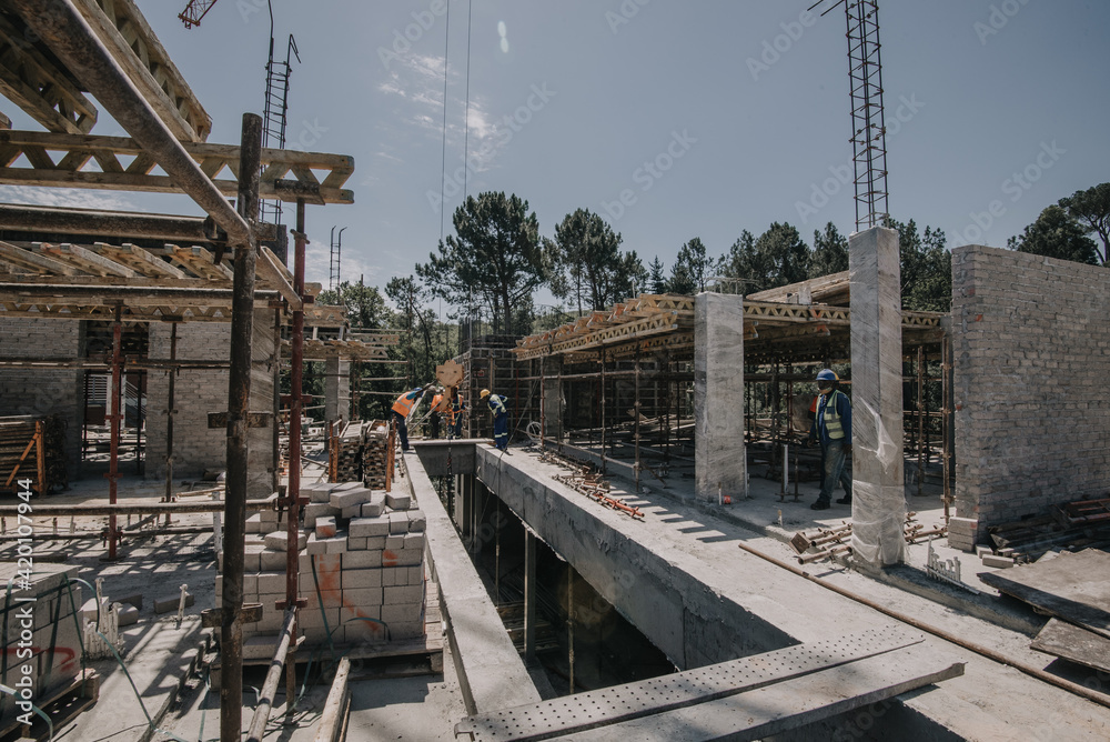 Construction site of multi-storey building with concrete slabs and ...