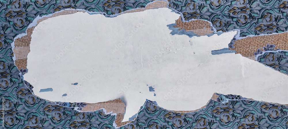 Old blue vintage damaged paper ripped wallpaper torn background blank ...