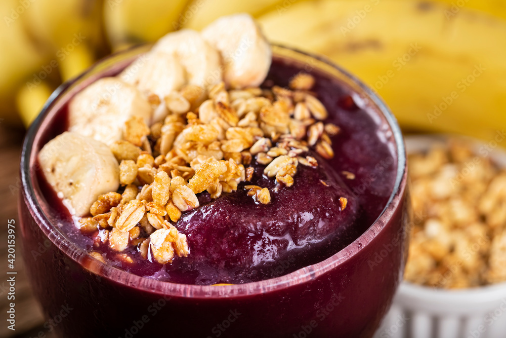 Açai with banana and granola. Brazilian acai. Stock-Foto | Adobe Stock