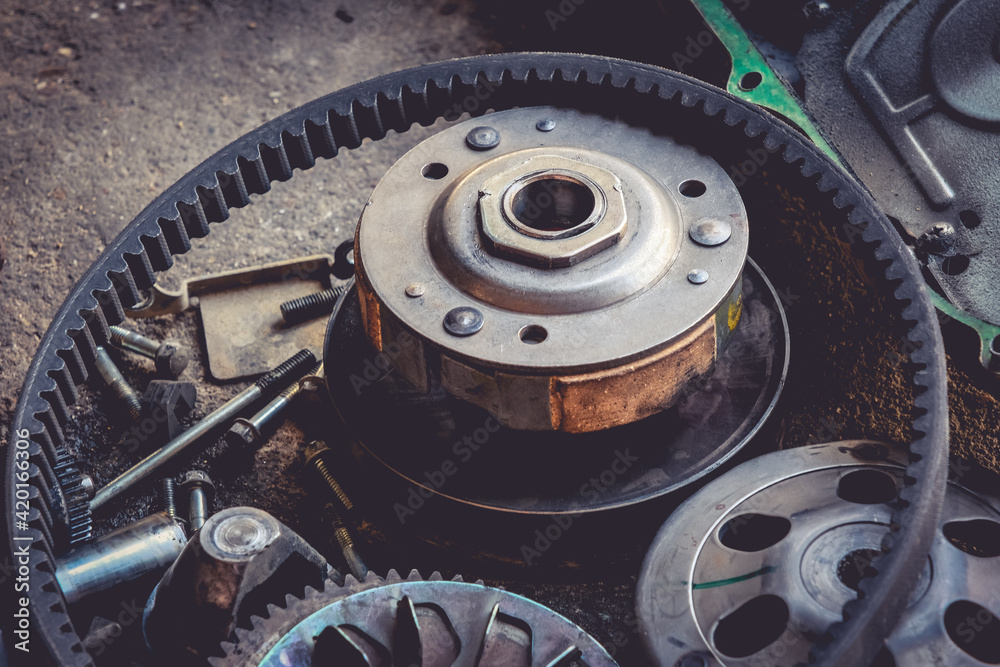 Mechanic to repair or check the motorcycle belt system, the engine belt ...