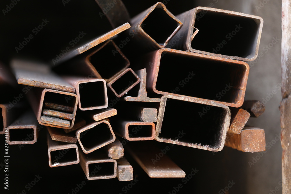 selective focus. iron profiles prepared in the iron factory Stock Photo ...