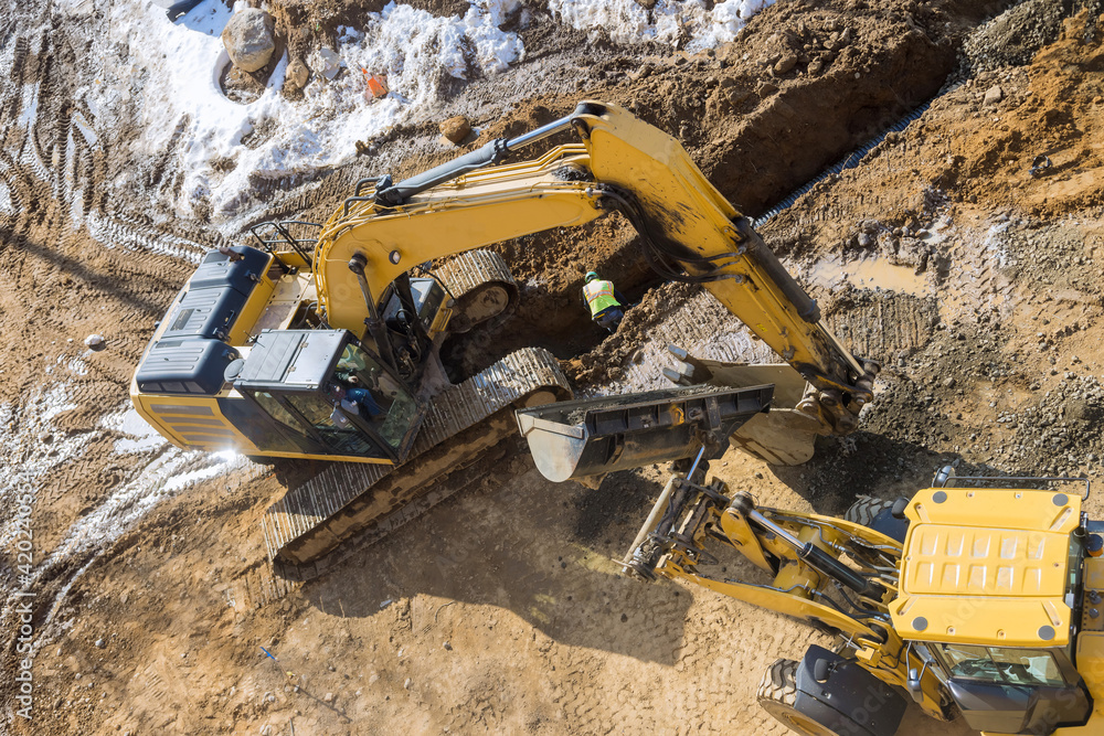 Construction site a huge trench, ditch for drainage canal utility pipe ...