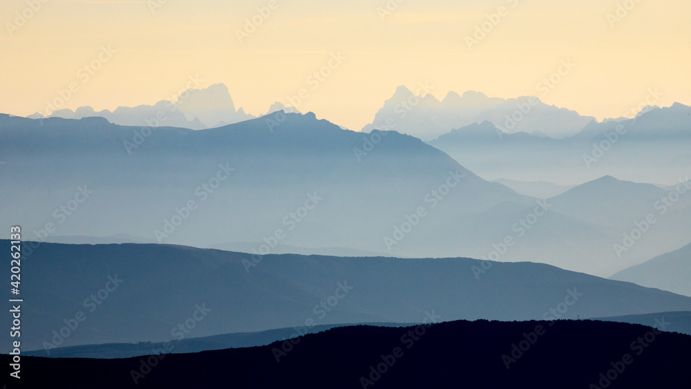 Blue gradient in the French Alps seen from the Mont Ventoux at sunrise ...