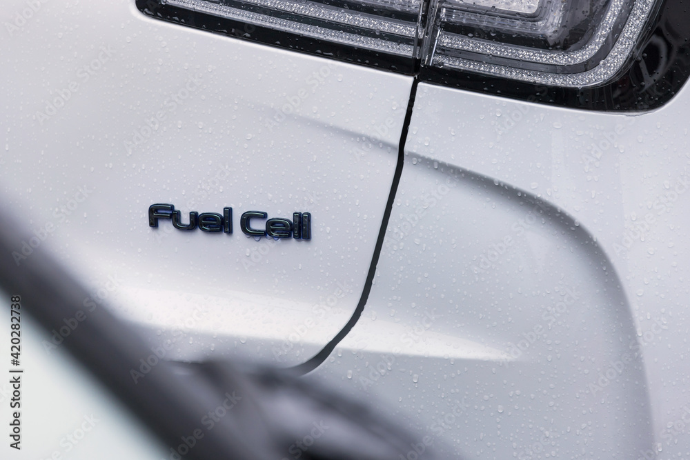 a modern car with a fuel cell sign Stock Photo | Adobe Stock
