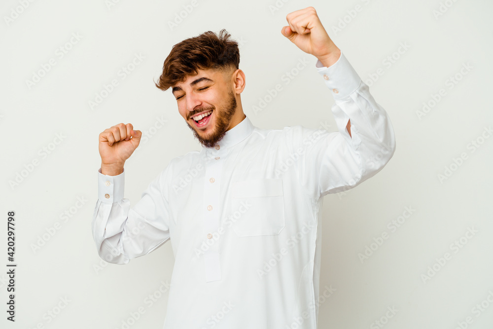 Young Moroccan man wearing a typical arab clothes isolated on white ...