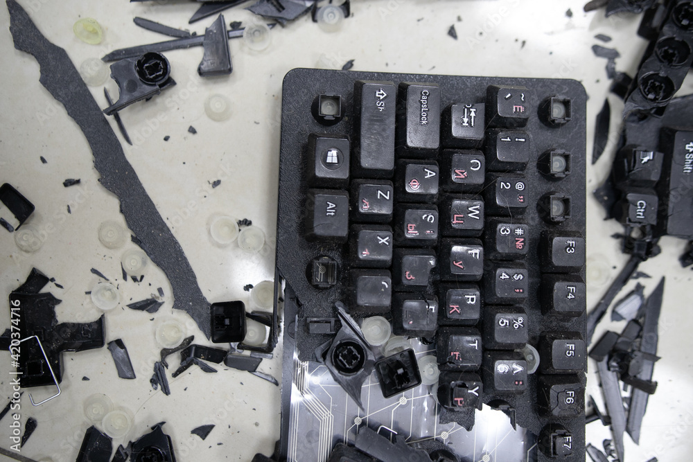 Broken keyboard. Destroyed keyboard. An image of computer frustration ...