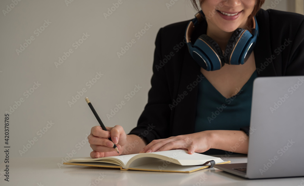 Young asian woman student e learning watching video training course sit ...