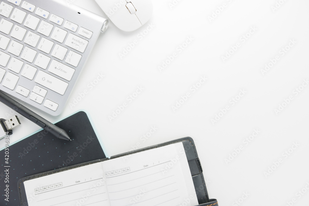 Flat lay, top view office table. Office supplies, keyboard, pen mouse ...
