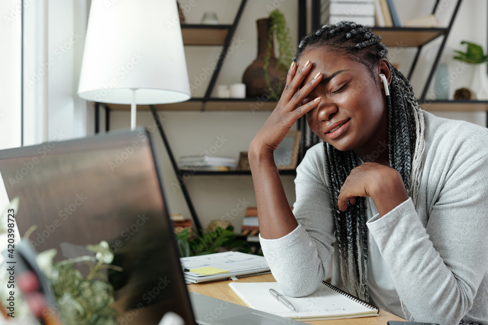 Sad Black female student almost crying after not passing text online ...