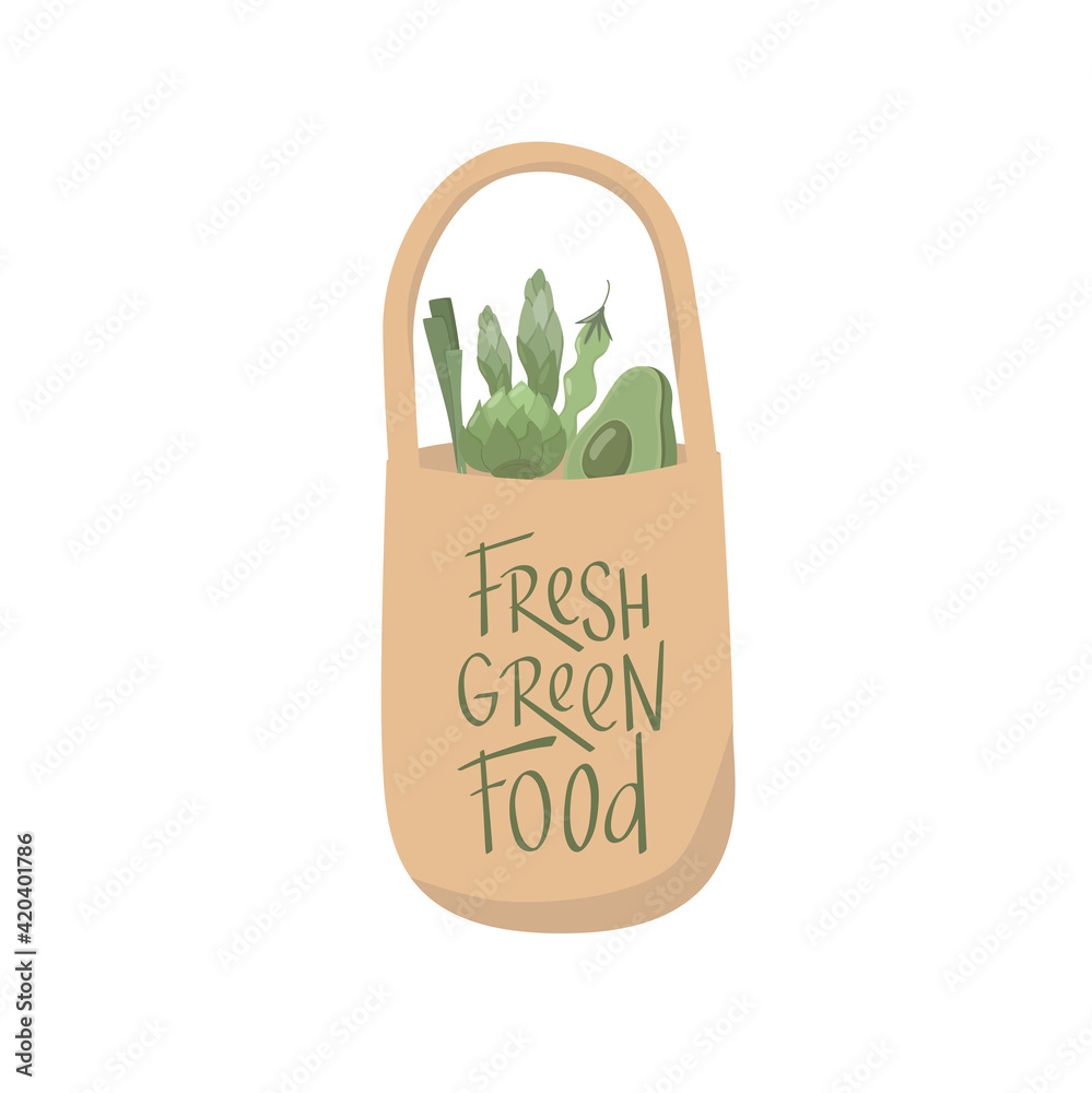 Fresh green food sign on eco shopping paper bag with green vegetables ...