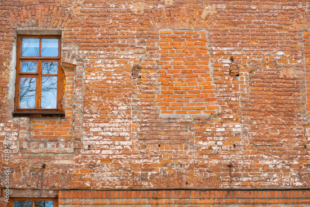 Window in an old brick wall with embedded arched windows, red brick ...