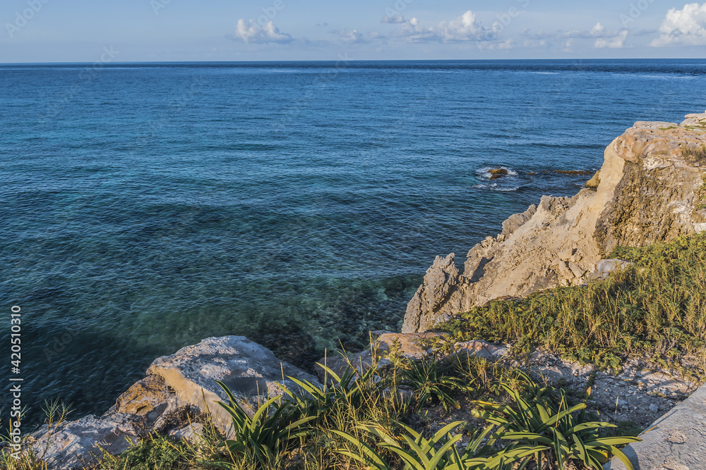 The beautiful nature of the island Isla Mujeres at sunset. Isla Mujeres ...