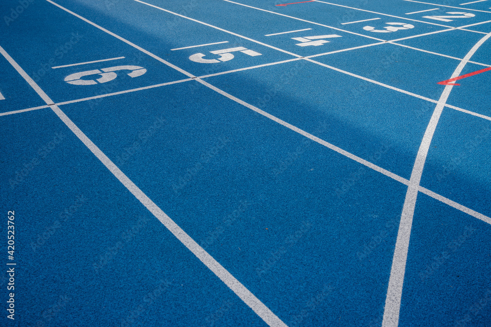 Blue Race Tracks In Sport Stadium Stock Photo | Adobe Stock