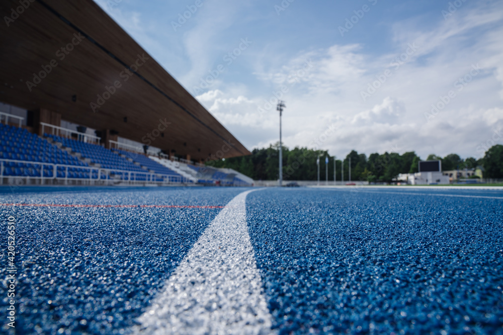 Blue Race Tracks In Sport Stadium Stock Photo | Adobe Stock