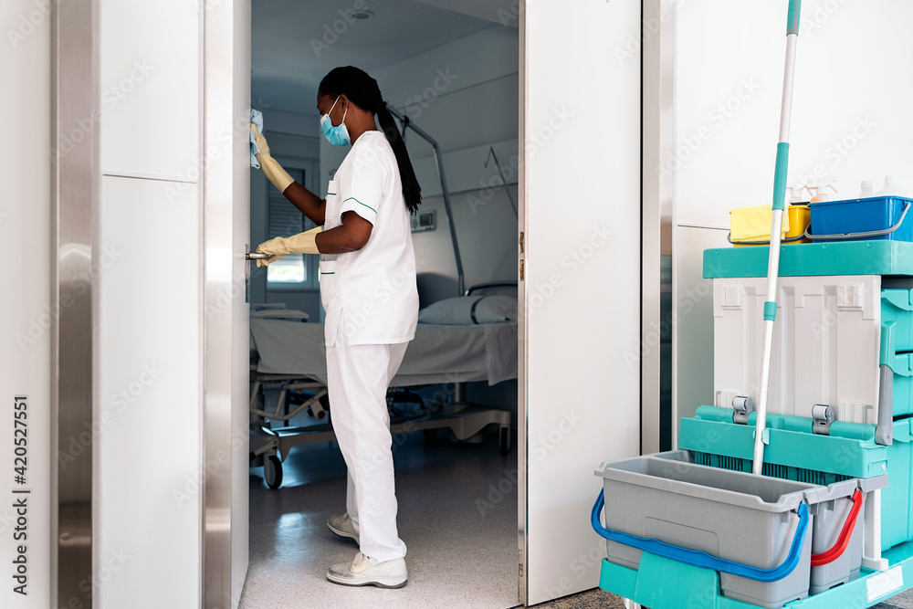 Cleaning Worker Disinfecting Hospital Stock Photo | Adobe Stock