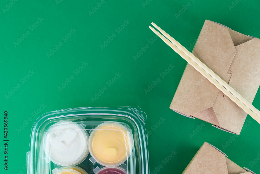 Food delivery service concept. Asian food in eco paper take away boxes ...