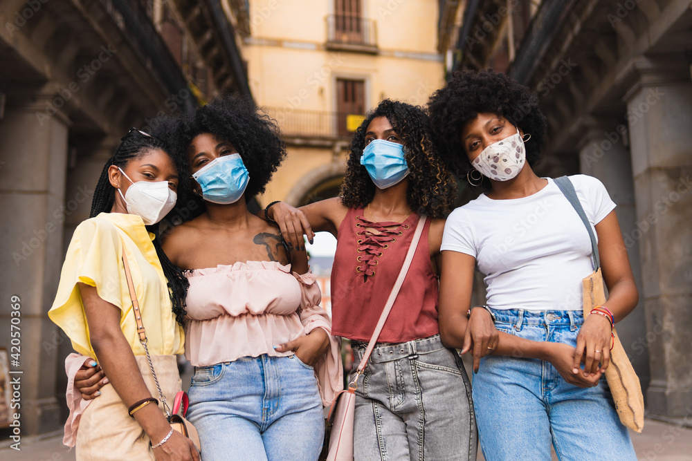 Girls wearing face masks Stock Photo | Adobe Stock